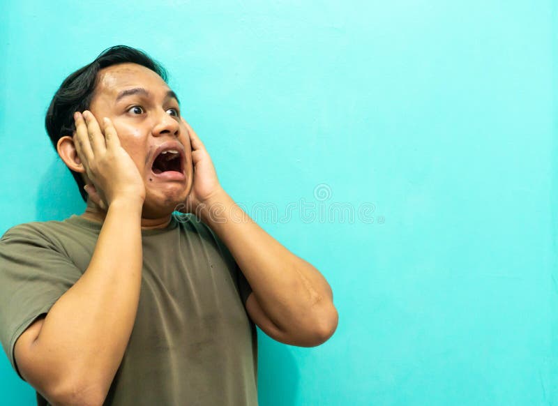 Wow and Shocked Face Expression of Young Asian Malay Man with Both Ears ...