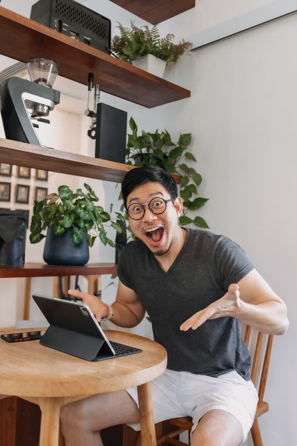 Wow and Surprise Face of Freelance Man Working in the Cafe. Stock Image ...