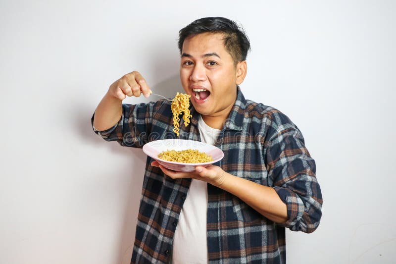 Wow and Surprised Funny Face of Asian Man Eat Instant Noodle Stock ... Wow and Surprised Funny Face of Asian Man Eat Instant Noodle Stock ...
