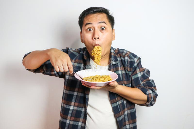 Wow and Surprised Funny Face of Asian Man Eat Instant Noodle Stock ... Wow and Surprised Funny Face of Asian Man Eat Instant Noodle Stock ...