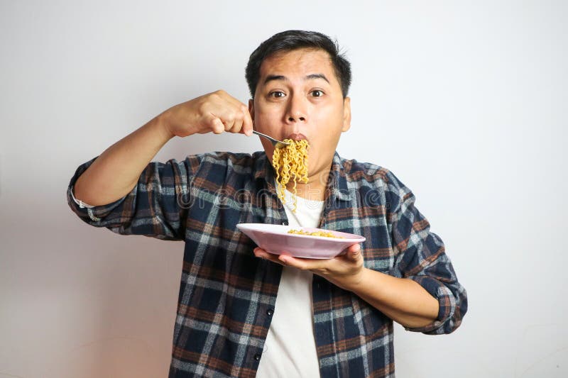 Wow and Surprised Funny Face of Asian Man Eat Instant Noodle Stock ... Wow and Surprised Funny Face of Asian Man Eat Instant Noodle Stock ...