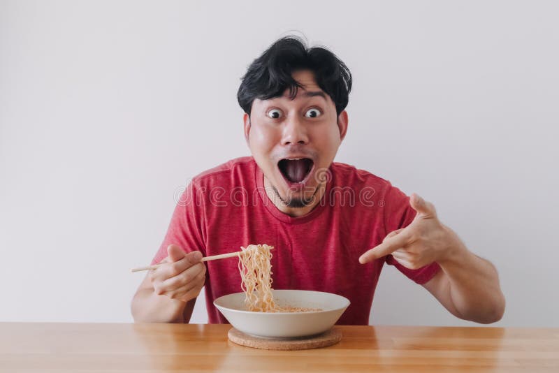 Wow and Surprised Funny Face of Man Eat Instant Noodle. Stock Image ... Wow and Surprised Funny Face of Man Eat Instant Noodle. Stock Image ...
