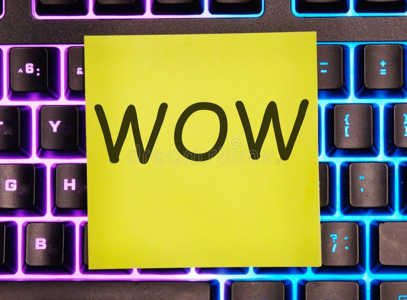 WOW Written on a Yellow Sticker on a Laptop Keyboard with Backlight ...