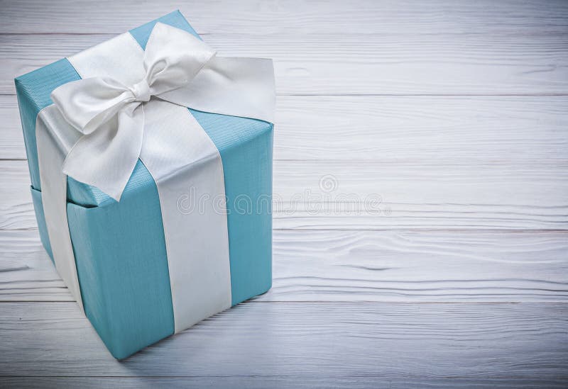 Wrapped Blue Gift Box on Wooden Board Celebrations Concept Stock Photo ...