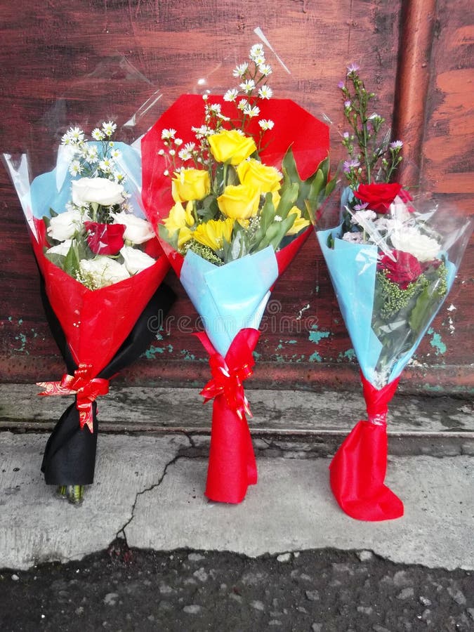 Wrapped Bouquets of Flowers Stock Image - Image of spring, nature: 79771733