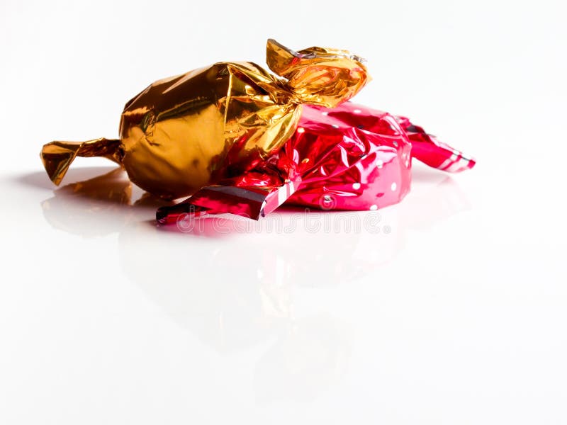 Candy Wrapped in Pink Foil stock photo. Image of aluminum - 23527980