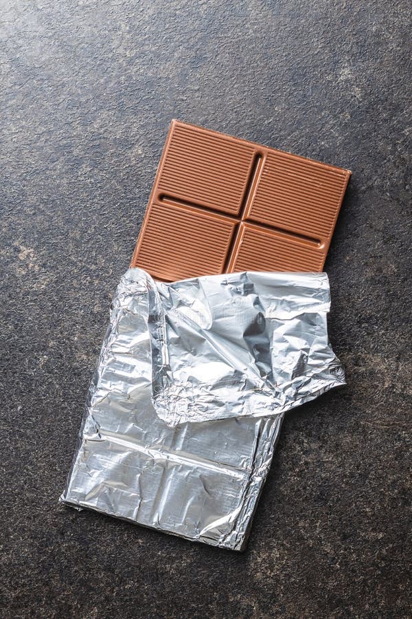 Wrapped Chocolate Bar in Aluminum Foil Stock Image - Image of ...