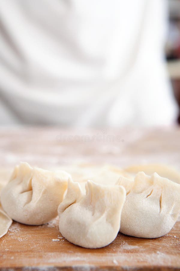Wrapped Dumplings and Dumpling Wrappers Stock Photo - Image of ...