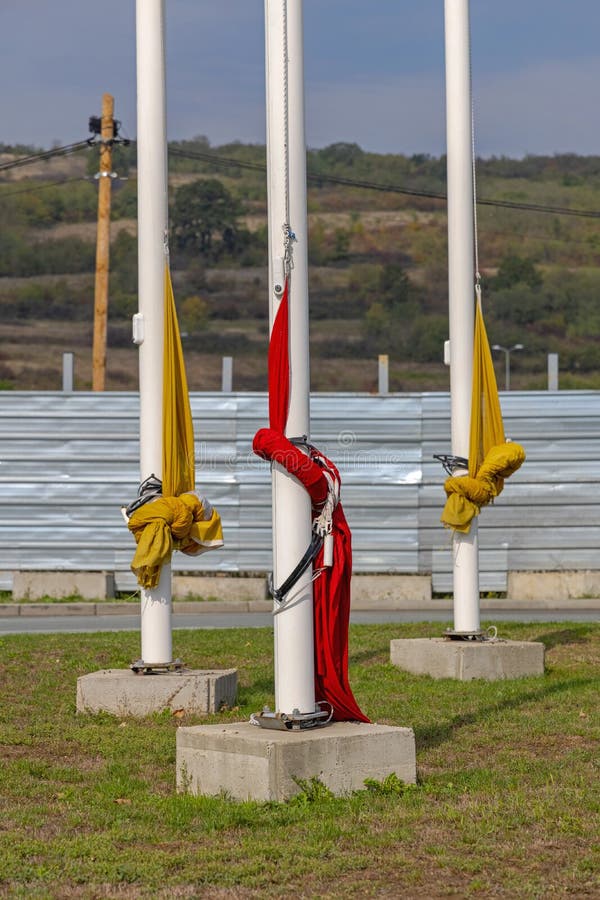 Strong Wind Flags Down stock photo. Image of exterior - 232092590