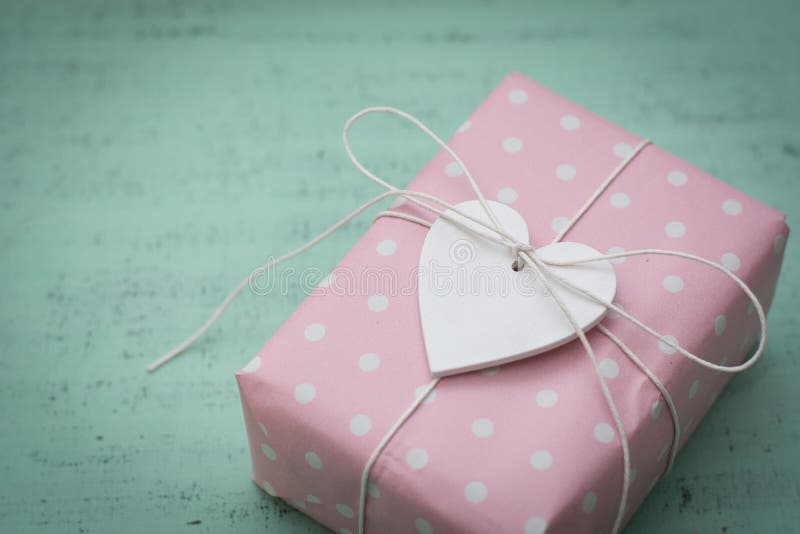 Wrapped gift with heart stock photo. Image of holiday - 102368214