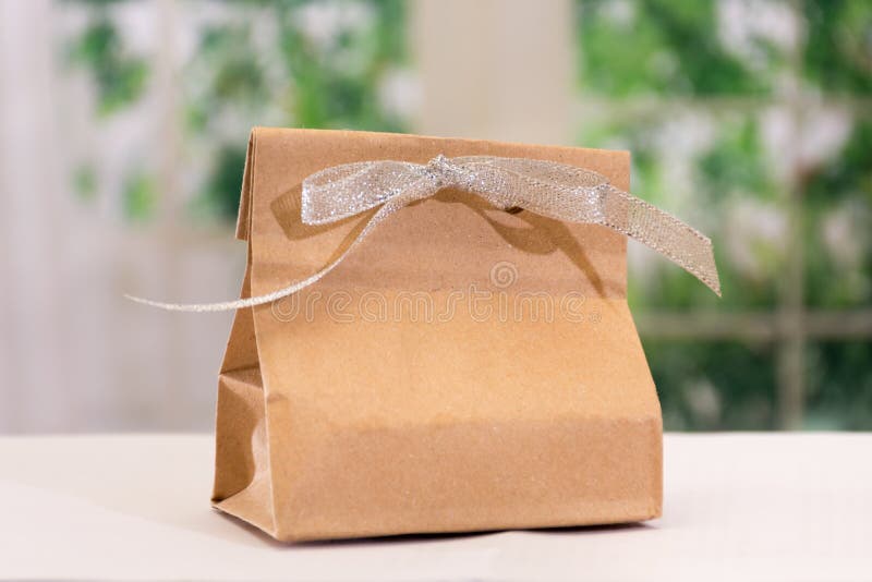 Wrapped gift on the table stock photo. Image of gift - 87581928