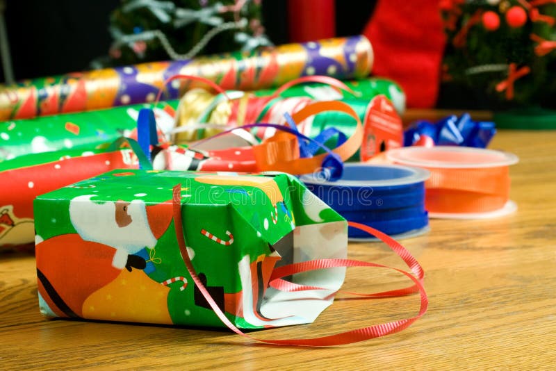 Wrapping the Gift stock image. Image of roll, christmas - 3798629