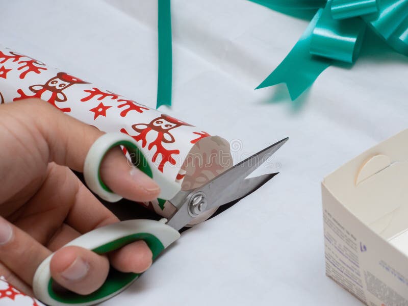 Wrapping Gift with Scissors, Tape and Paper Stock Image - Image of ...