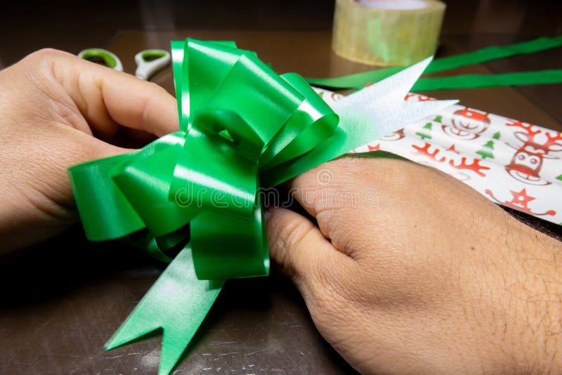 Wrapping Gift with Scissors, Tape and Paper Stock Photo - Image of ...