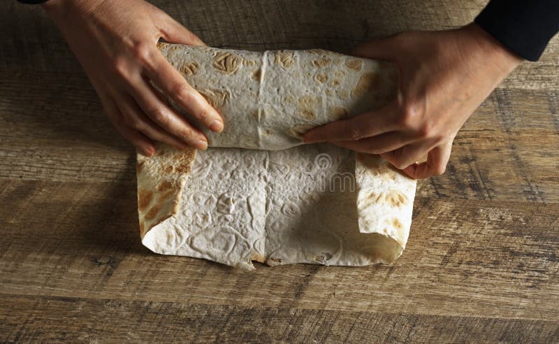 Wrapping Shawarma in Lavash Stock Photo - Image of delicious, chicken ...