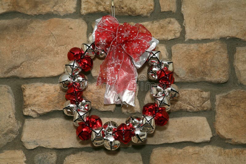 Wreath on stone wall stock photo. Image of christmas - 16353596