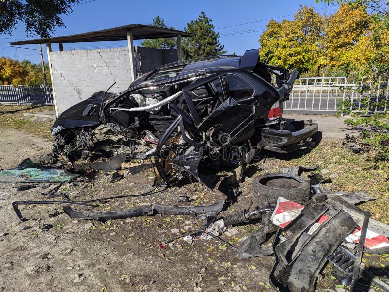 Wrecked Car Beyond Repair Thrown on the Side of the Road Stock Photo ...