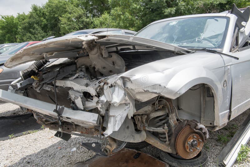 Wrecked Convertible in a Junk Yard Stock Photo - Image of automobile ...