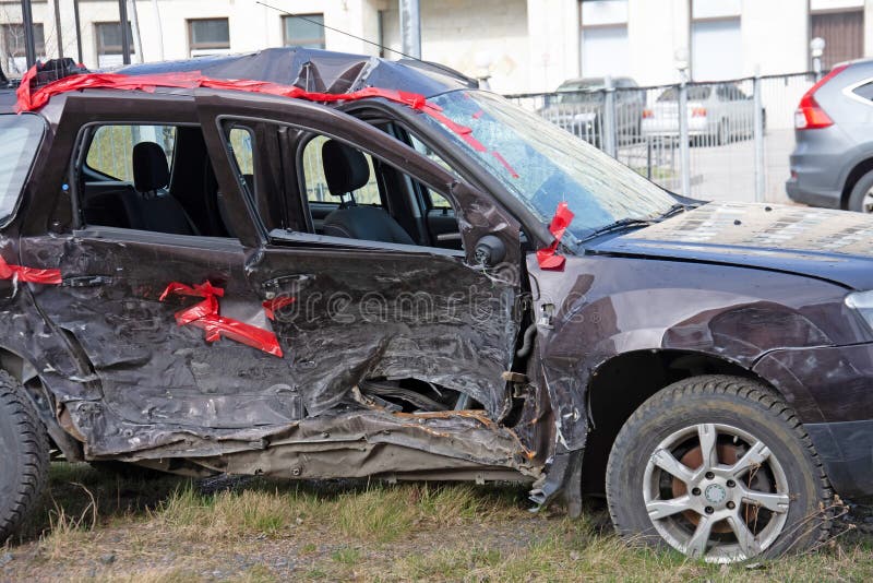 Wrecked Crumpled Car from the Right Side after a Severe Accident with a ...
