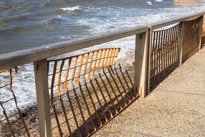 Wrecked Iron Sea Railings Destroyed by the Strong Waves Stock Photo ...