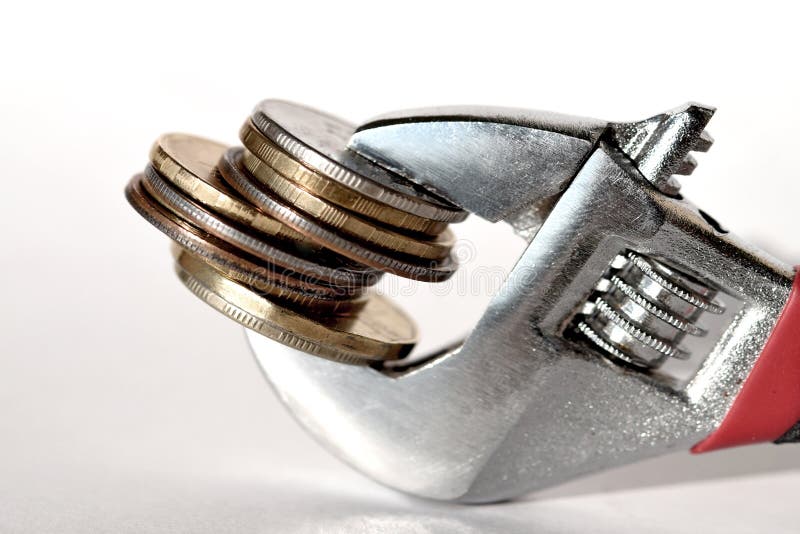 Wrench and Coins . the Concept of Financial Reliability Stock Image ...