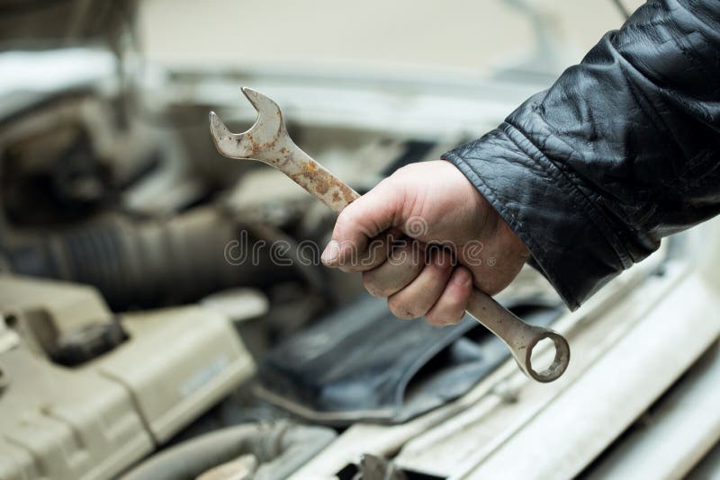 Hand with Wrench. Auto Mechanic. Stock Photo - Image of service ...