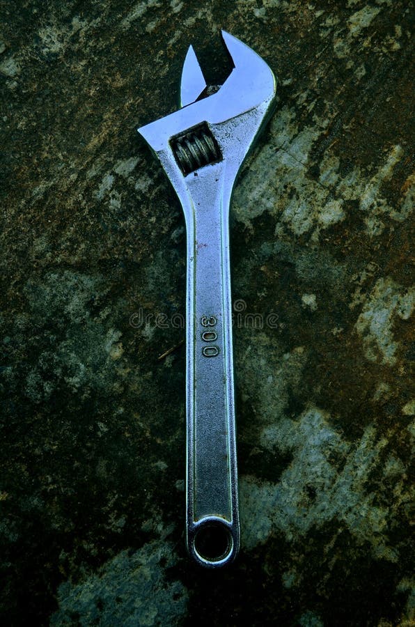 Wrench tool in portrait stock image. Image of toll, wrench - 223665525