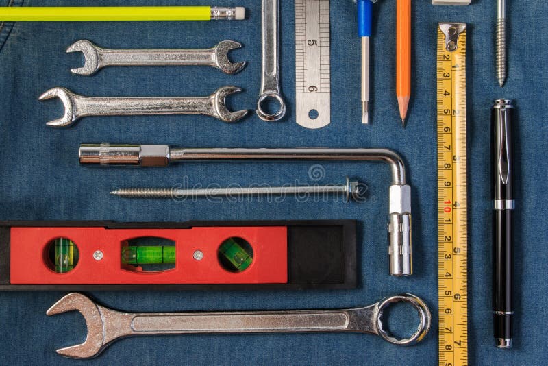 Wrench Tools on a Denim Workers. Flat Lay Style Stock Image - Image of ...