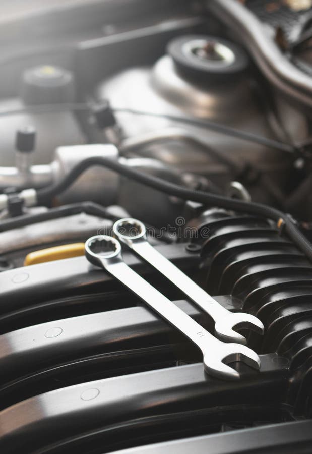 Wrenches Lie on the Engine of the Car in the Engine Compartment Stock ...