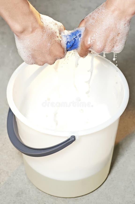 Wringing a cleaning cloth stock photo. Image of hands - 31174912