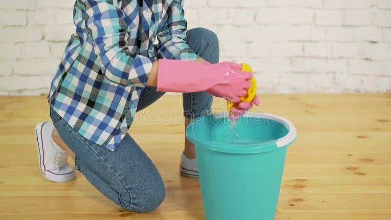 Wringing a cleaning rag stock footage. Video of aprons - 119303922