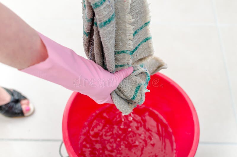 Wringing of floorcloth stock image. Image of hygiene - 55223947