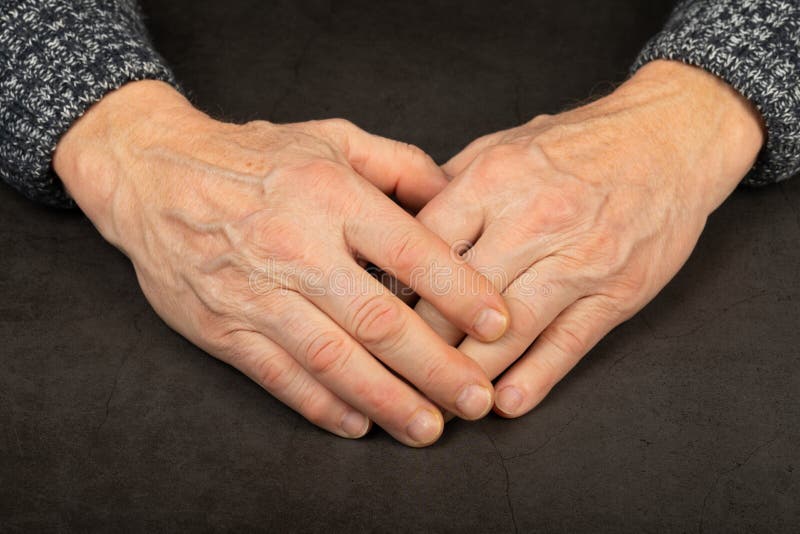 Wrinkled elderly hands stock photo. Image of finger, hold - 69798408