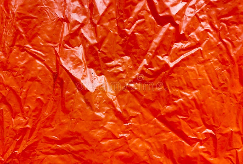 Wrinkled Orange Glossy Paper As a Background Texture Stock Photo ...
