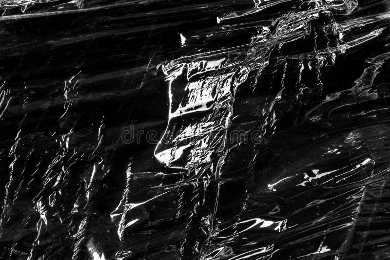 Wrinkled Plastic Wrap Texture on a Black Background Wallpaper Stock ...