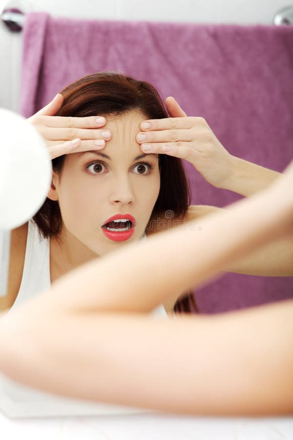 Wrinkles on the forehead. stock image. Image of morning - 22381299