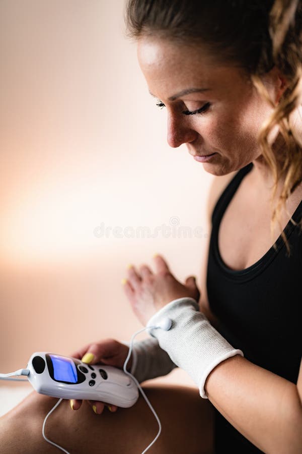 Wrist Physical Therapy with TENS Electrode Brace Pads, Transcutaneous ...
