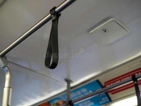 Wrist Strap Hanging on Handrail in Public Transit Bus Stock Photo ...