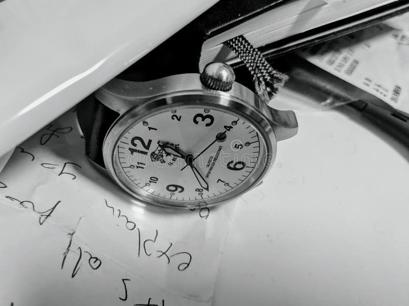 Wrist Watch on Desk with Written Paper Stock Photo - Image of written ...