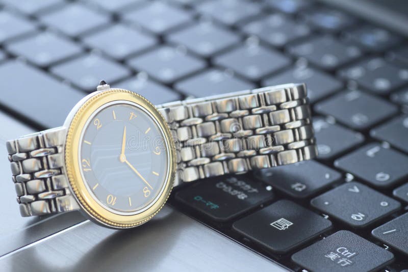 A Wrist Watch Over Keyboard Stock Photo - Image of digital, close: 23696034