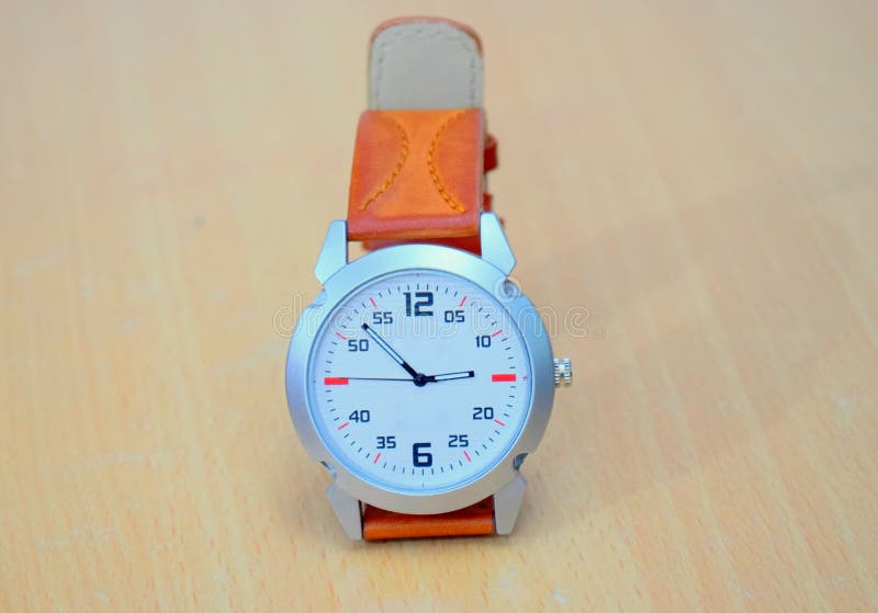 Wrist Watch Showing Time Placed on a Board Stock Image - Image of ...