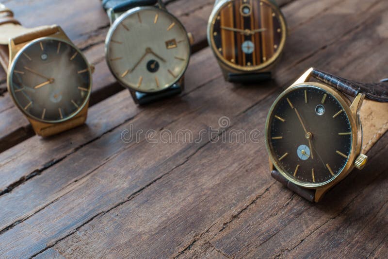 Wrist Watches on a Wooden Table Stock Photo - Image of minute, timer ...