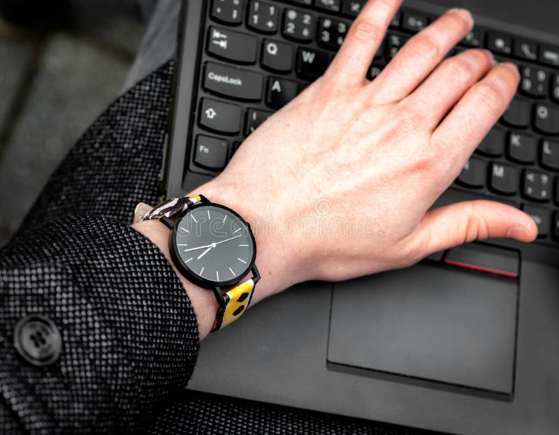 Wristwatch. Hand on the Keypad of Notebook Stock Photo - Image of black ...