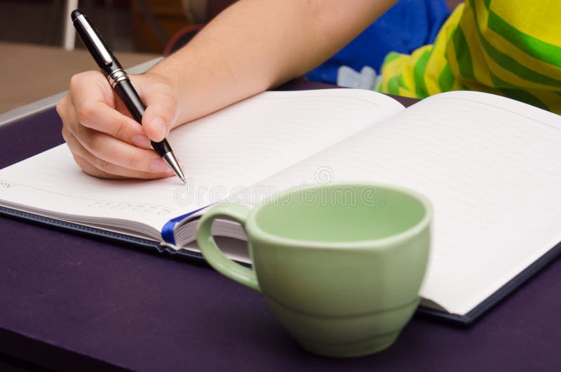 Write Activity with a Pen and a Book Stock Photo - Image of female ...