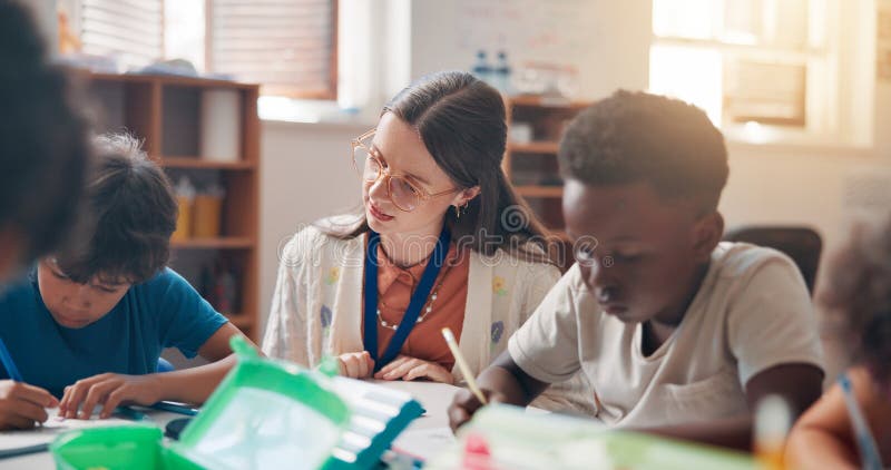 Write, Education and Teacher Helping Children in Classroom for Language ...