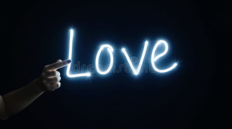 Write Love in Radiant Light â€“ a Person Holding LED Wand in Darkness ...