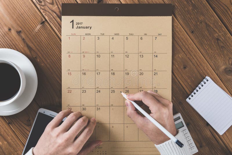 Write a Schedule To a Calendar Placed on a Wooden Table Stock Image ...