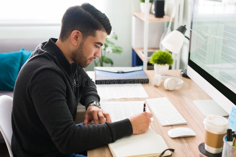 Writer Sitting at His Desk and Working on His Next Project Stock Photo ...