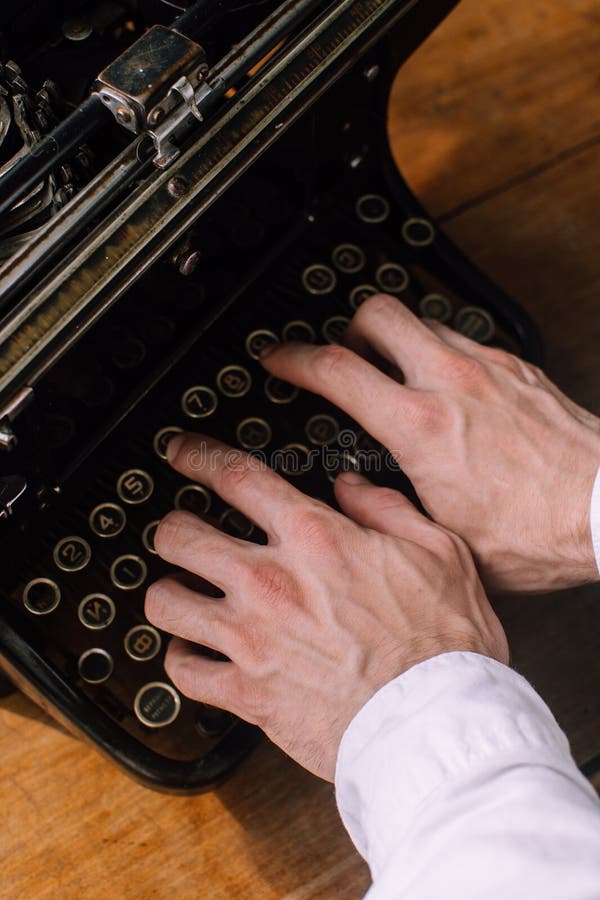 A Writer Typing on a Vintage Typewriter Stock Image - Image of sheet ...