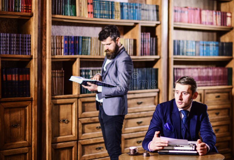 Writer or Young Author with Typewriter Search Information for Book ...